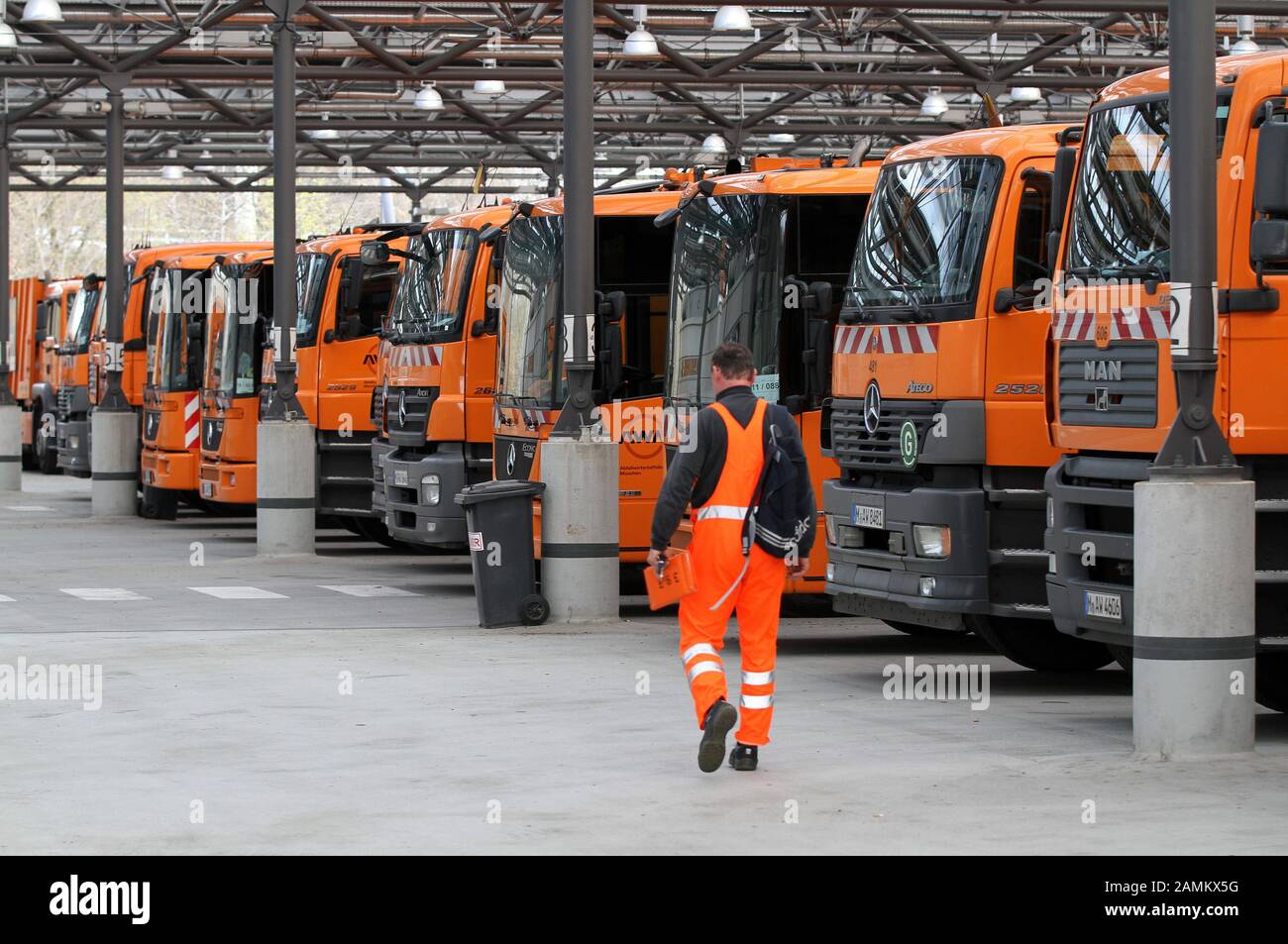 Refuse collection vehicles in the carport of the headquarters of the ...