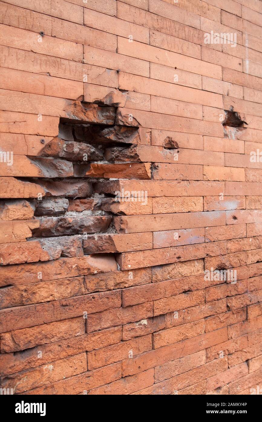 Bullet Holes In Brick Wall