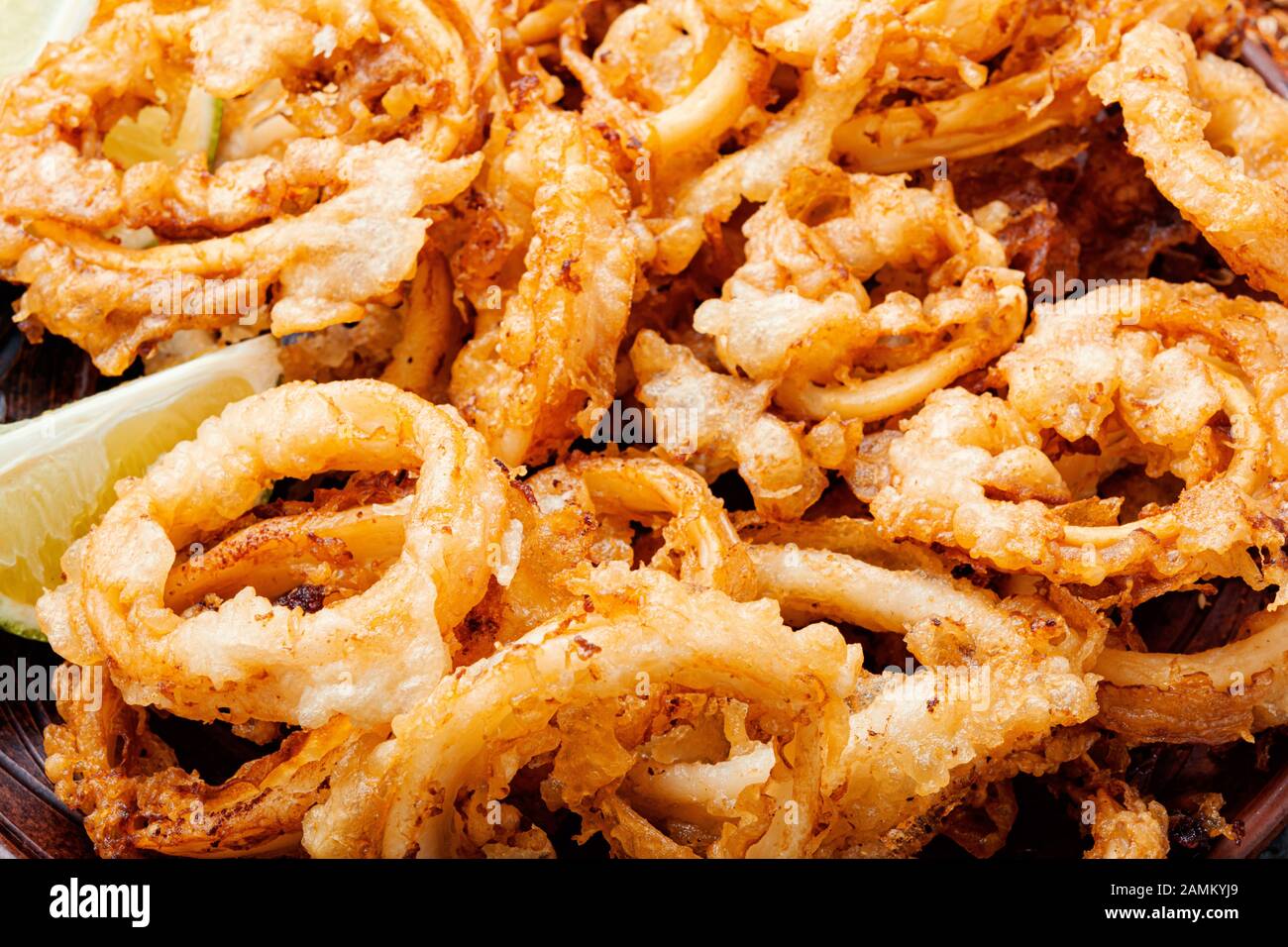 Fried squid or calamari rings with sauce.Food background Stock Photo ...