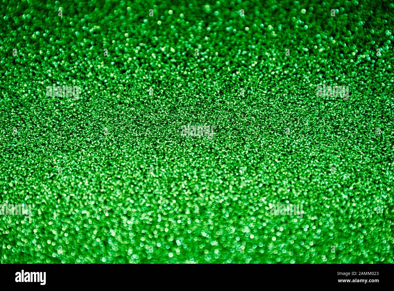 Green glittering pattern with nice bokeh effect Stock Photo - Alamy