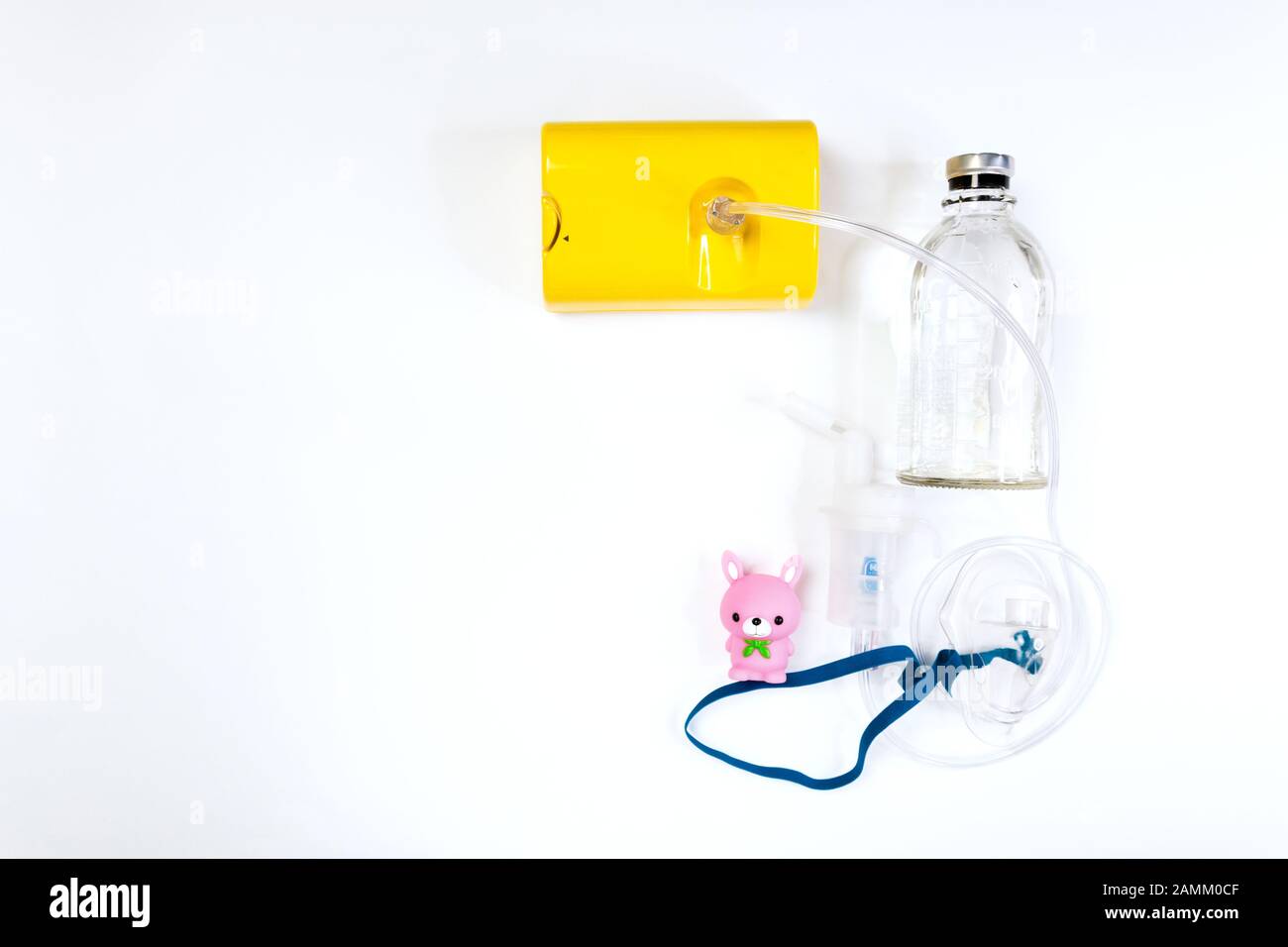 tube mask nebulizer and tubular transparent cable, saline on a white ...
