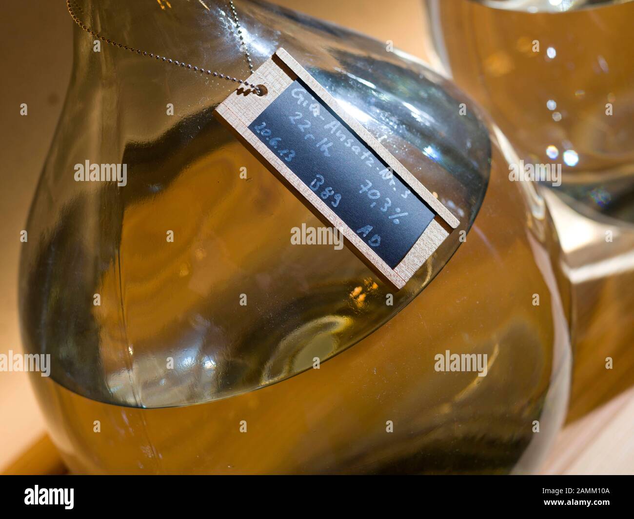 Schnapps bottle in the noble distillery Lantenhammer. [automated ...