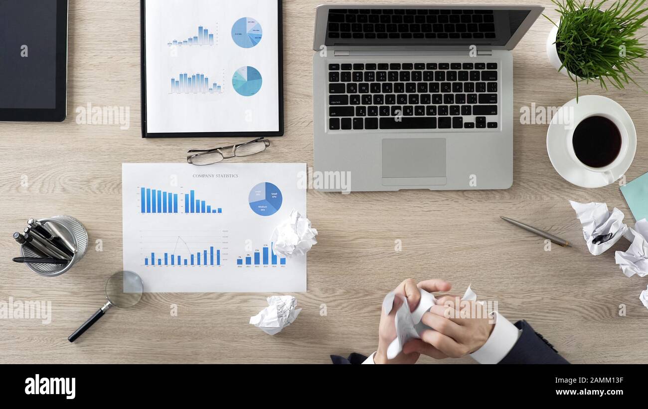 Crisis at work, businessman trying to create new successful business ...