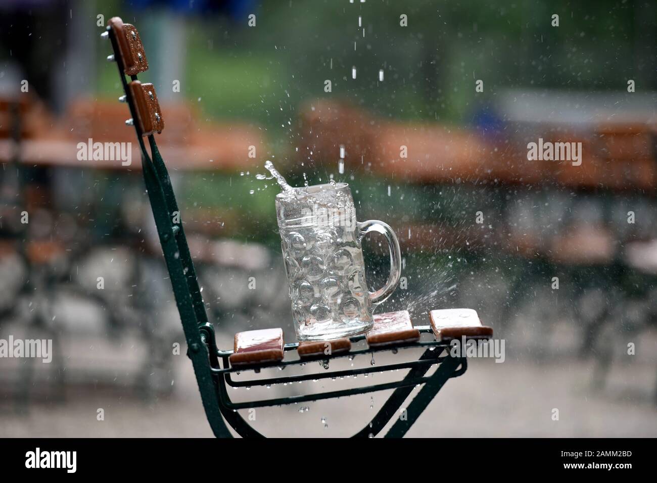 The beer garden in the deer garden in the rain. In the foreground a ...
