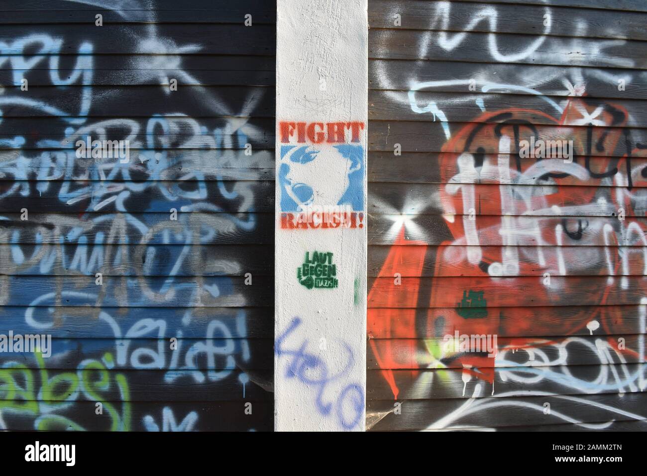 "Fight Racism" graffito against racism and xenophobia in the schoolyard ...