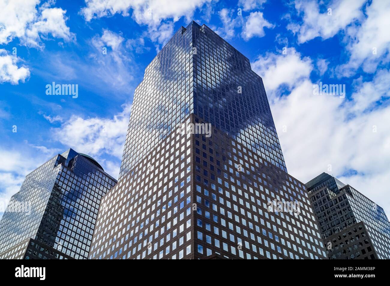 Office building close up with reflecting sky Stock Photo - Alamy