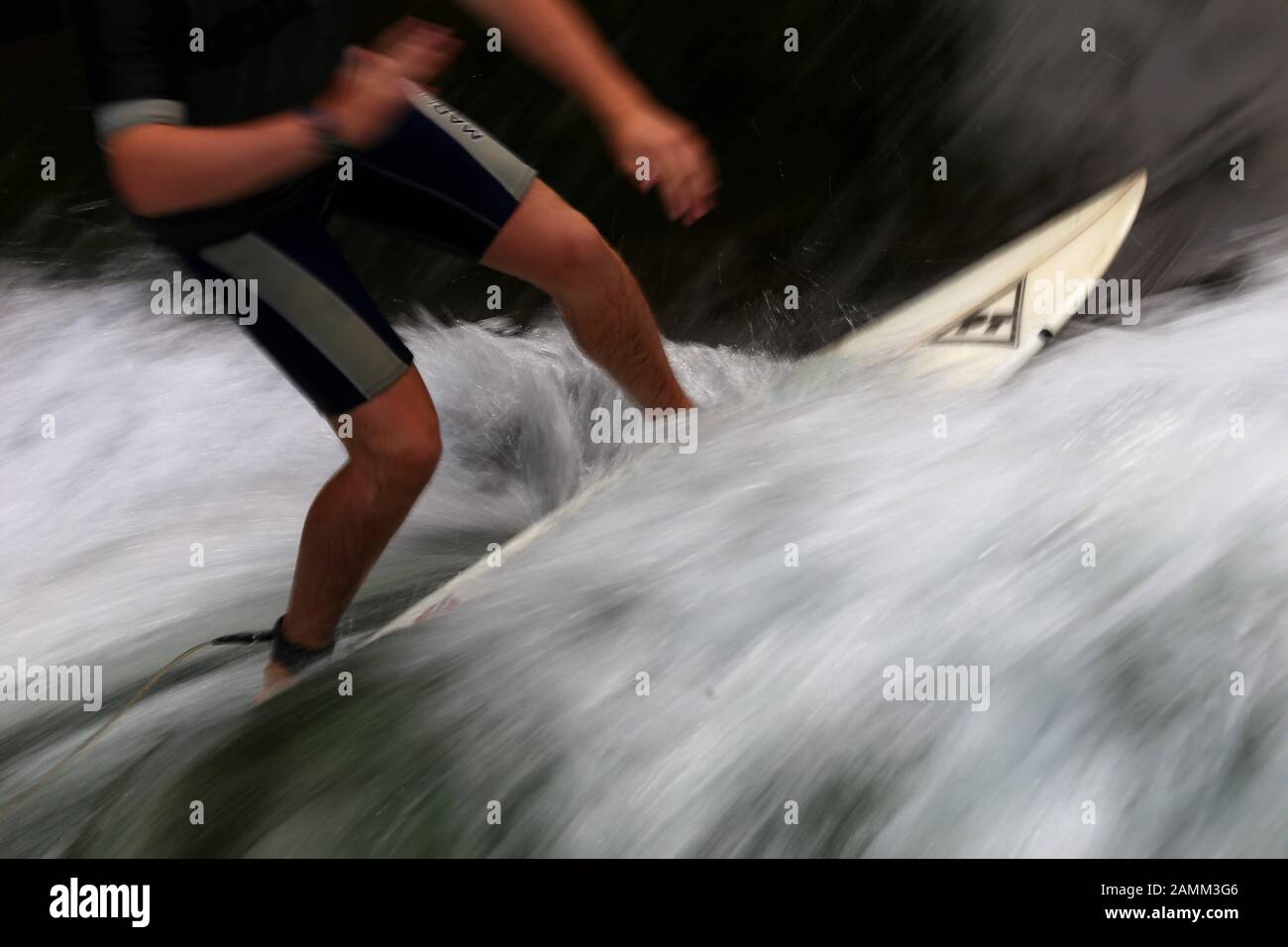 A surfer at the raft site in Munich. [automated translation] Stock ...