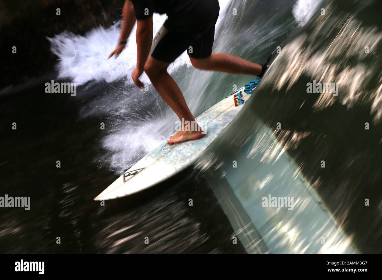 A surfer at the raft site in Munich. [automated translation] Stock ...