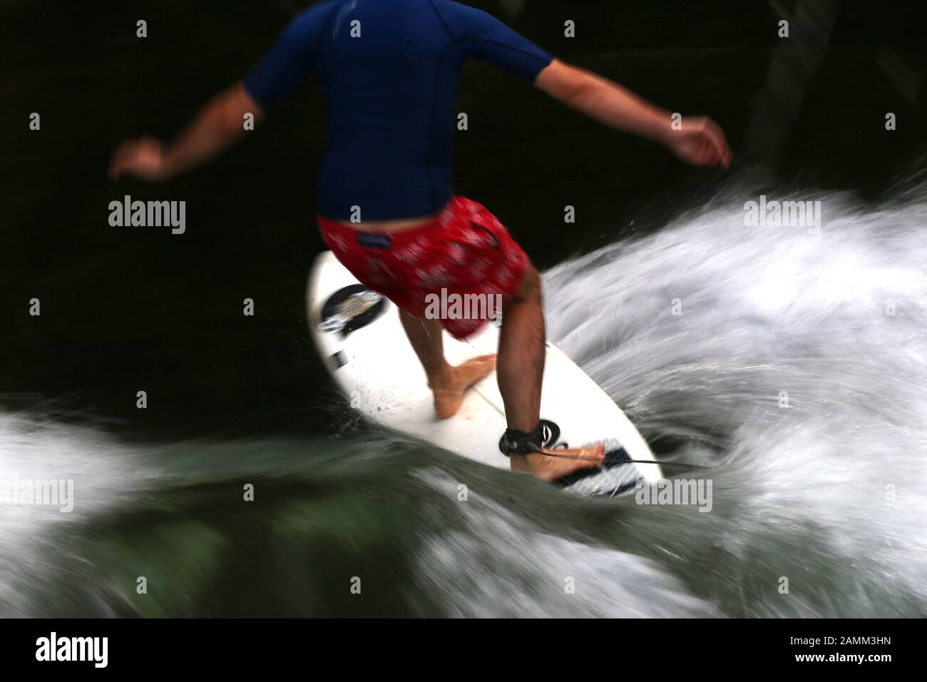 A surfer at the raft site in Munich. [automated translation] Stock ...