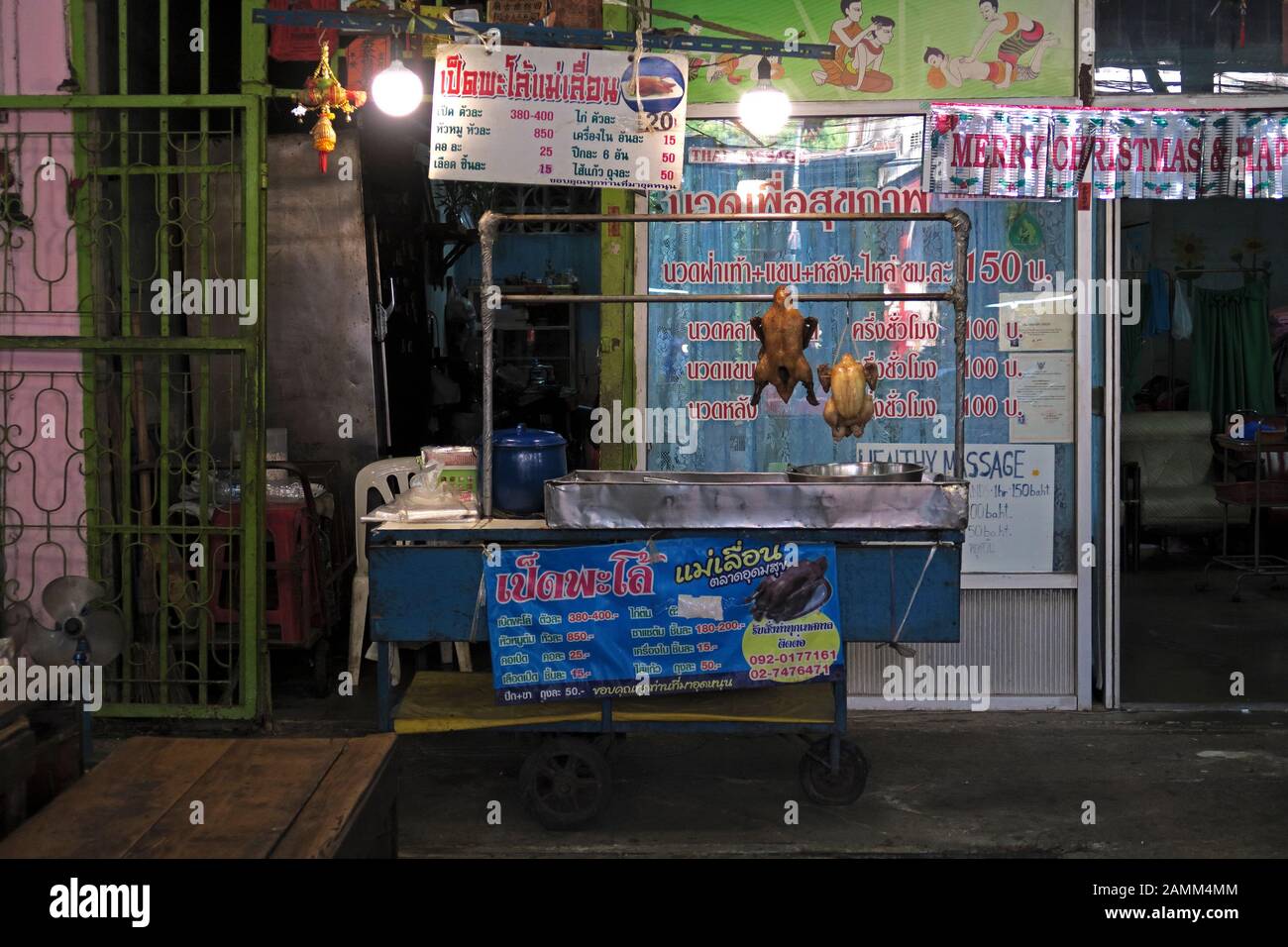 bangkok, thailand - 2020.01.10: two roasted geese hanging at a stall in ...