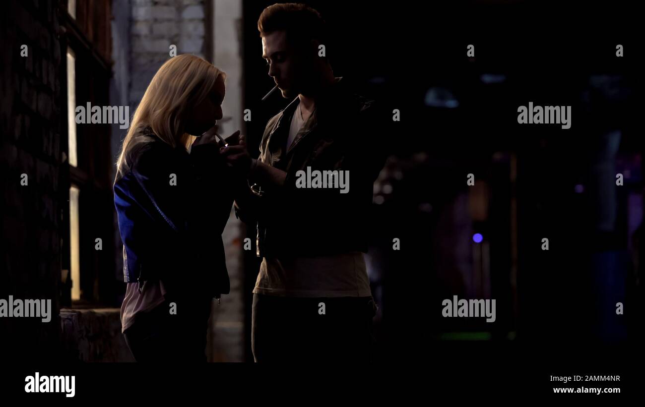 Lighting cigarette club hi-res stock photography and images - Alamy