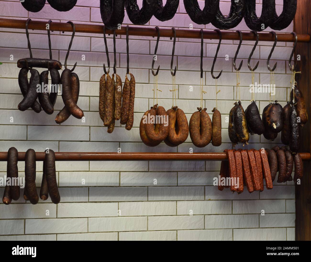Sausages in a shop in the butcher's shop at the Viktualienmarkt in ...