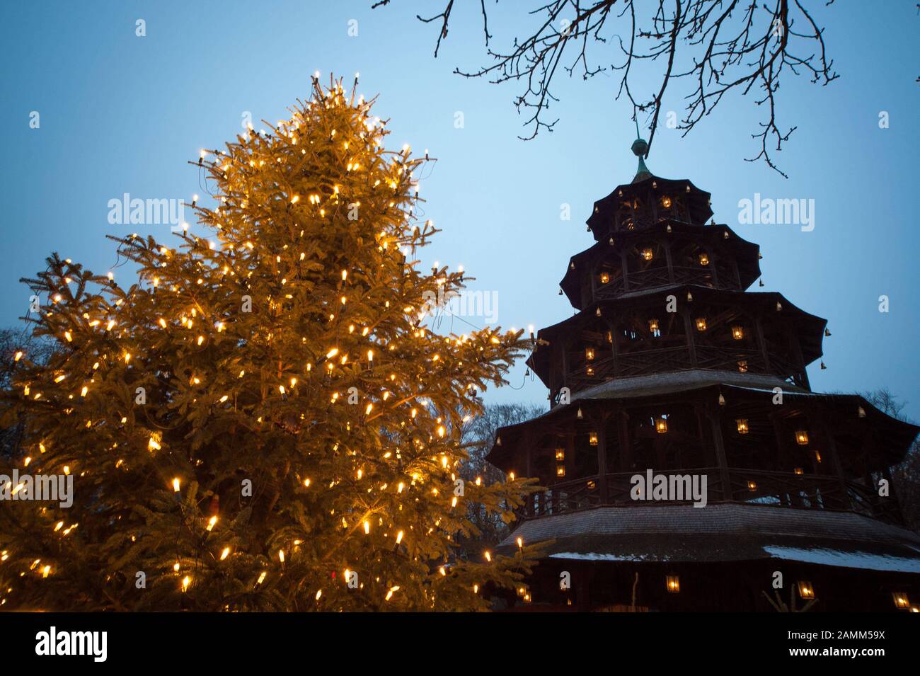 Atmospherically illuminated Christmas market at the Chinese Tower in ...