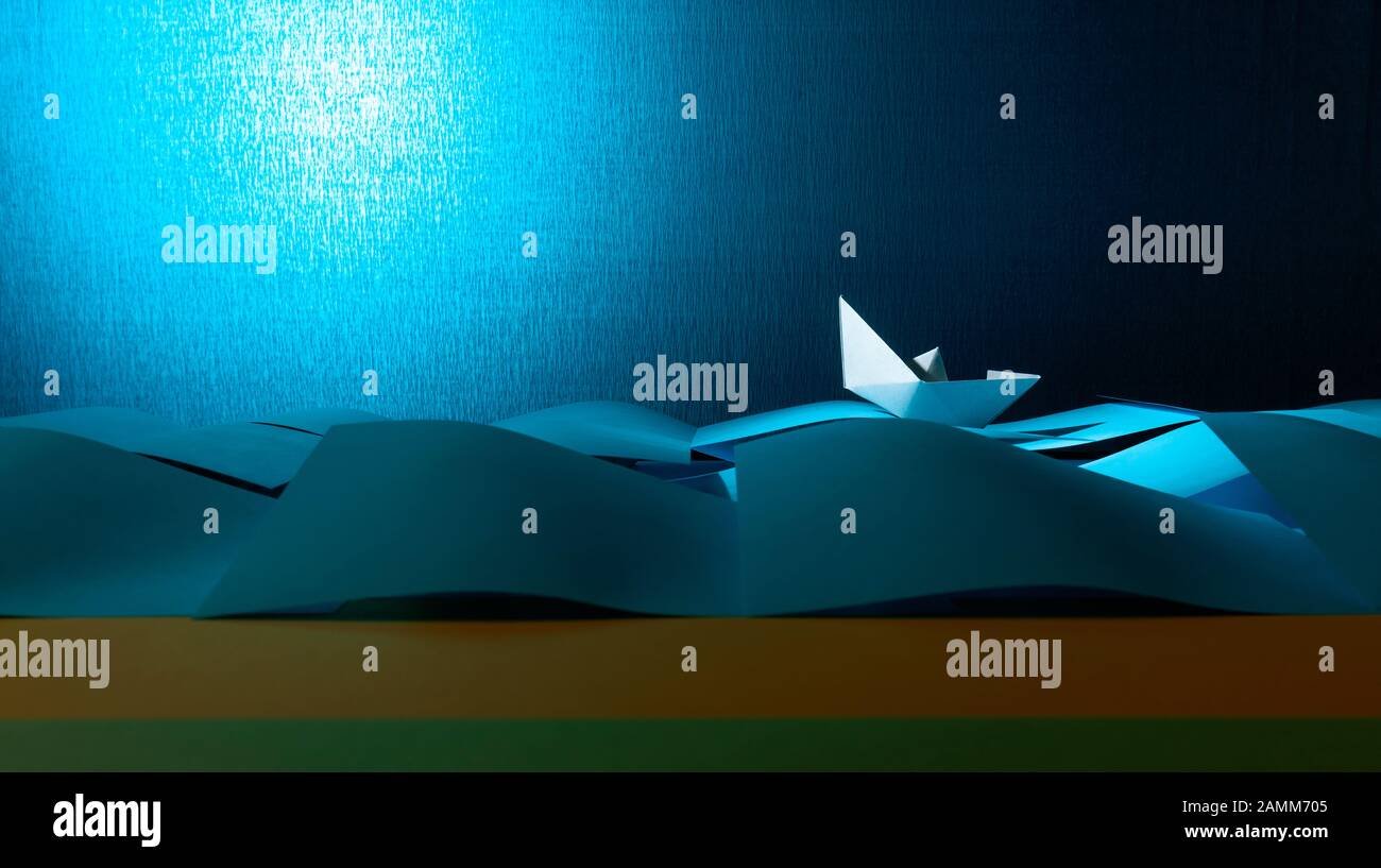 Paper ship in the paper sea. Concept of the theme of bureaucracy. Copy ...
