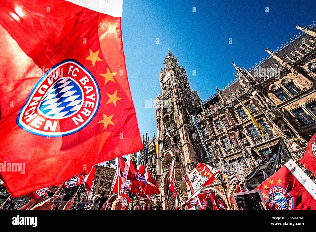 Cheering fans of FC Bayern Munich on Munich's Marienplatz [automated ...