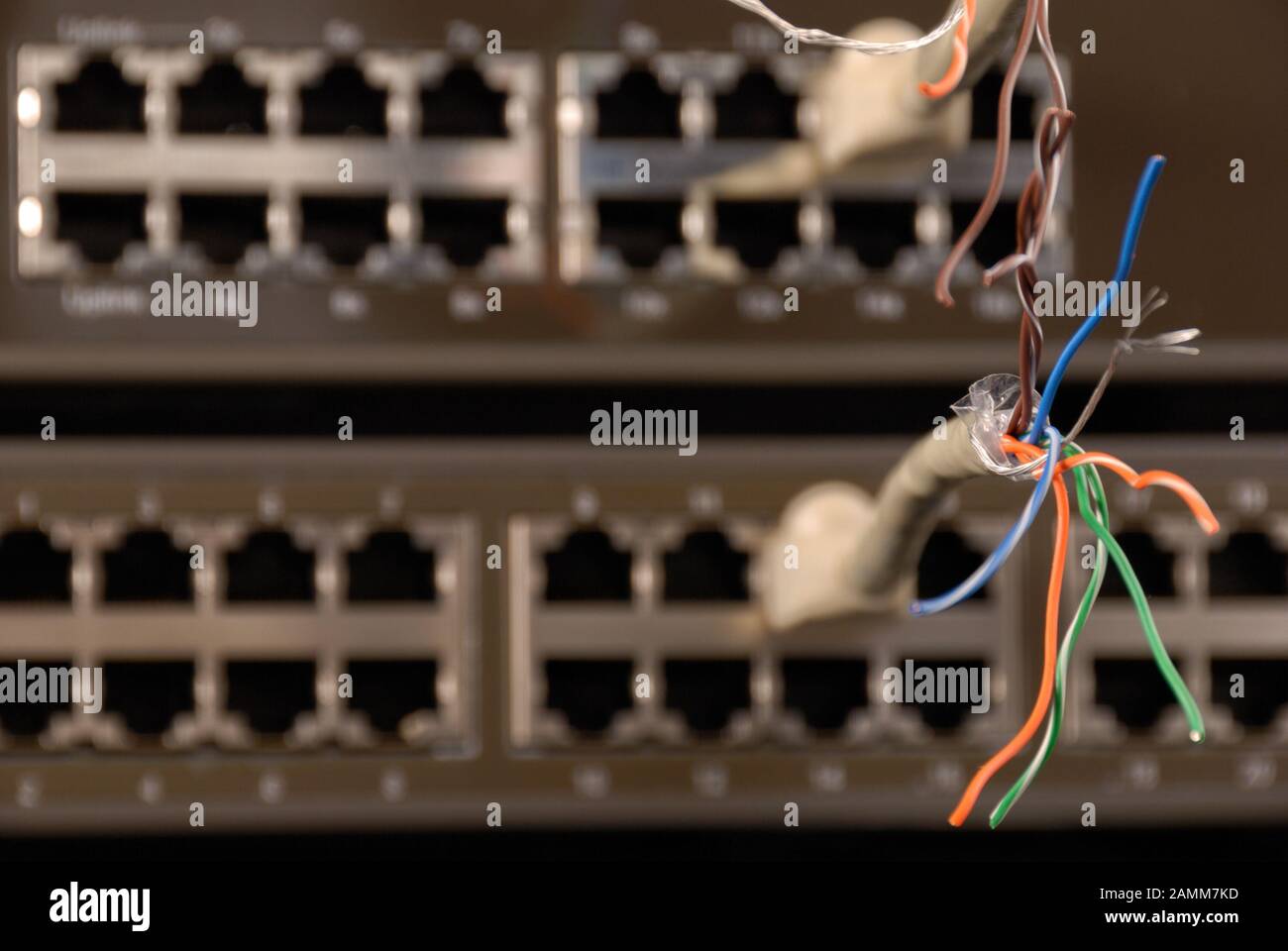 Vandalized network cables in switch hub, broken connection concept ...