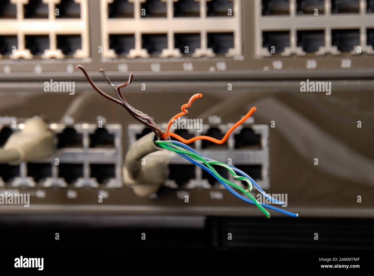 Vandalized network cables in switch hub, broken connection concept ...