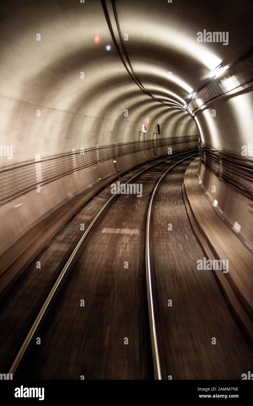 Rail grinding train on underground tracks between the stations Basler ...