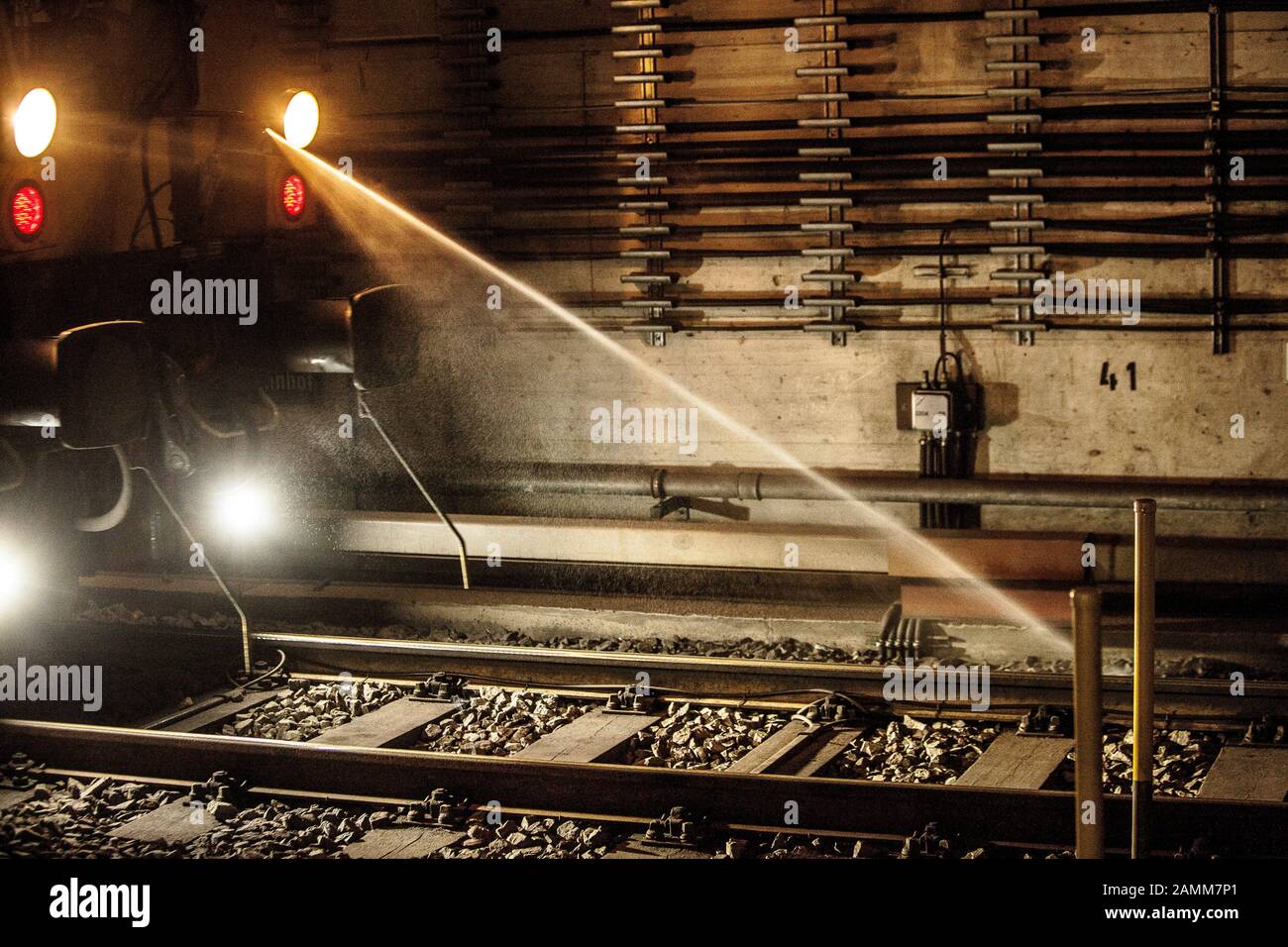 Rail grinding train on underground tracks between the stations Basler ...