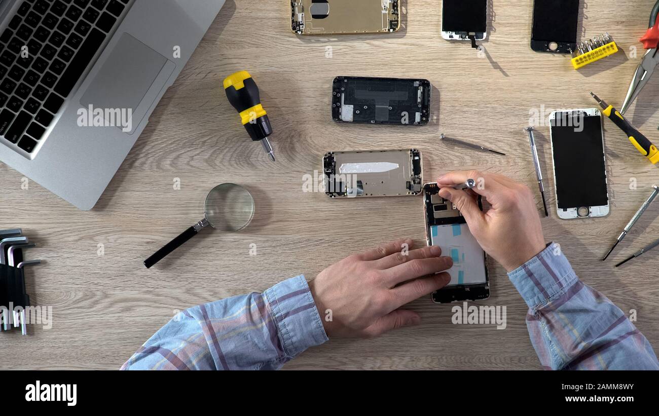 Upgrading technology hi-res stock photography and images - Alamy