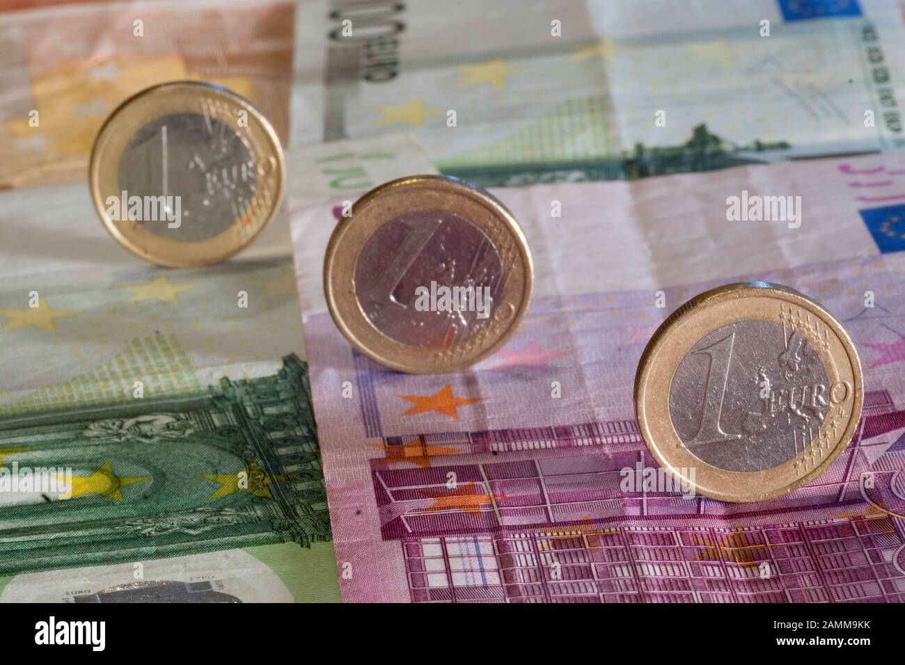 notes and coins [automated translation] Stock Photo - Alamy