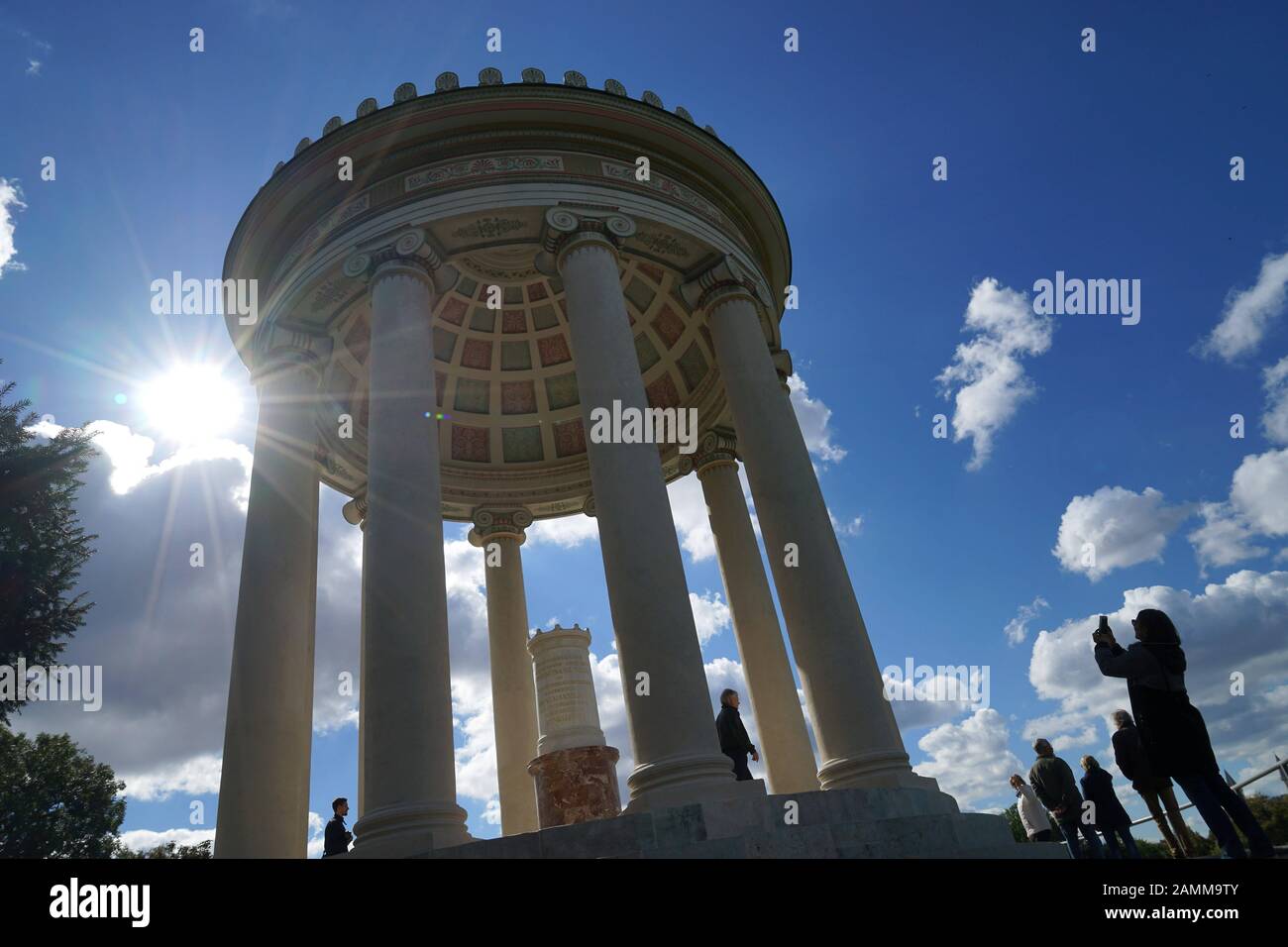 A woman takes a picture of the newly restored Monopterus in the English ...
