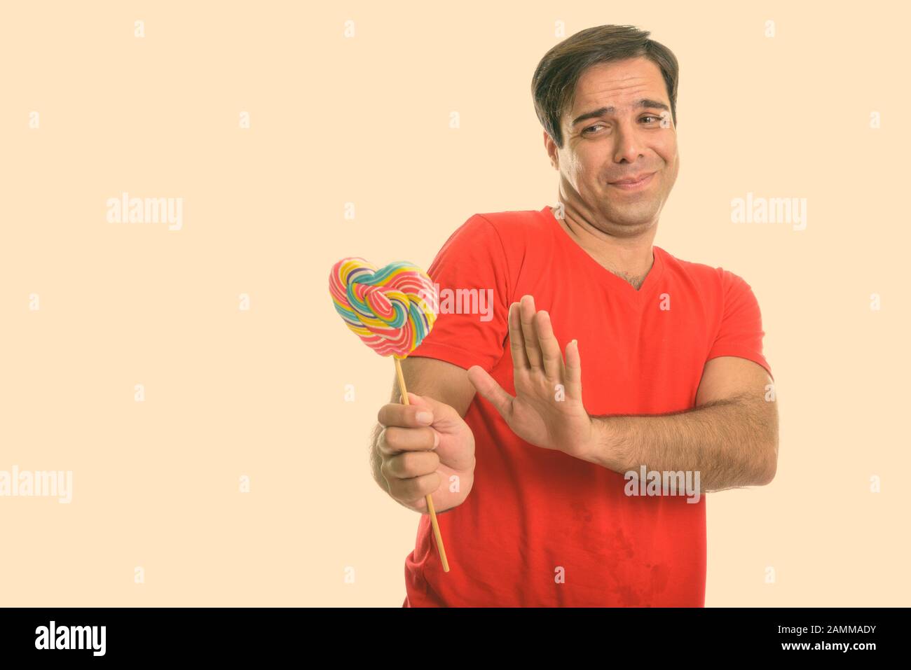 Man hand holding stop sign hi-res stock photography and images - Alamy