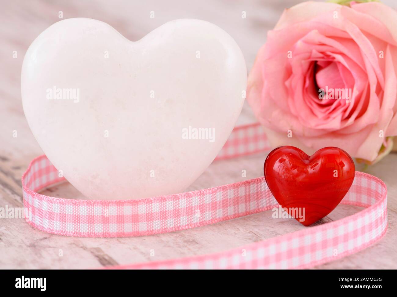 Rose and heart as symbol of love with ribbon [automated translation ...
