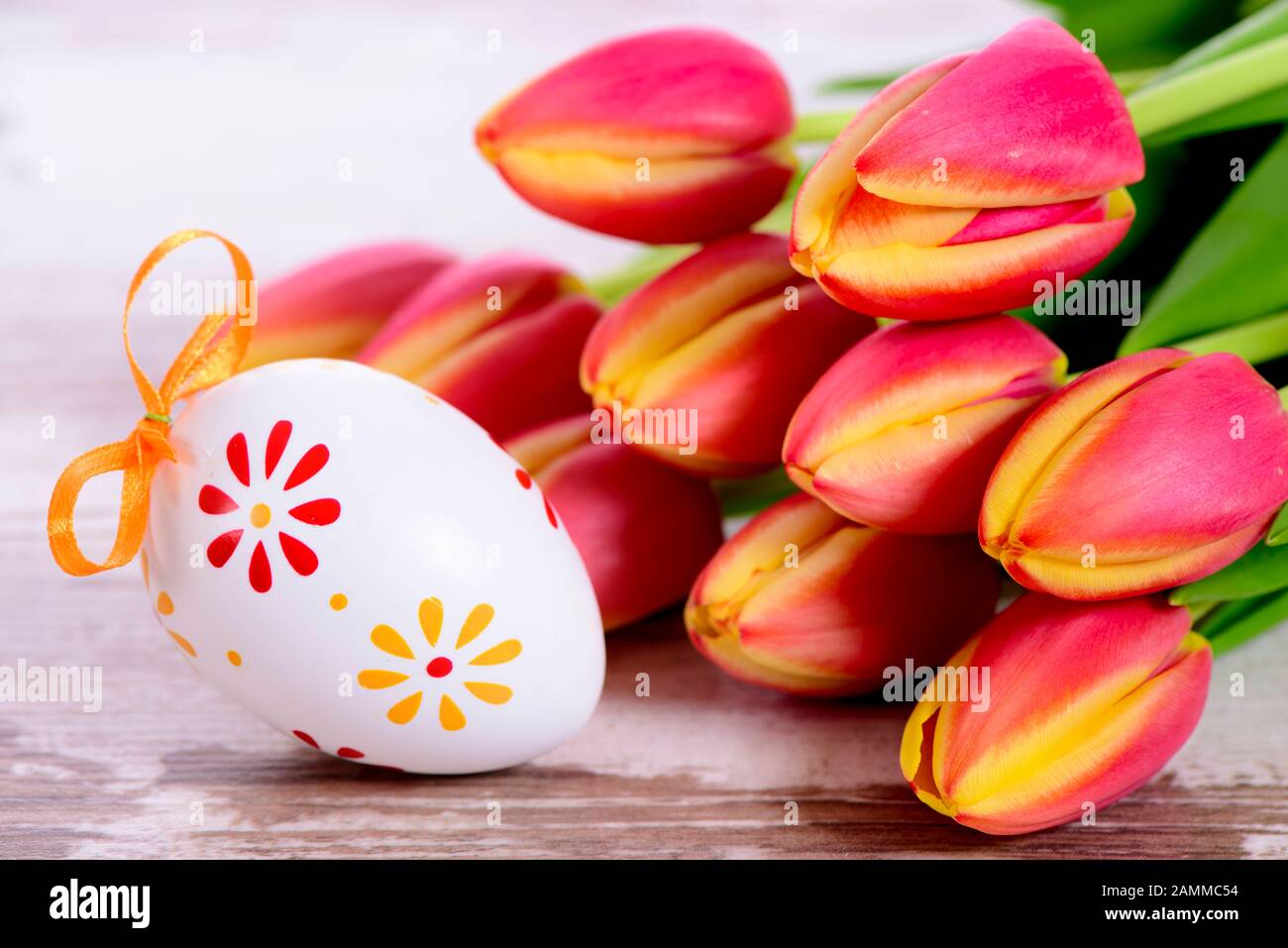 Bouquet of flowers with Easter egg as symbol for Easter [automated ...