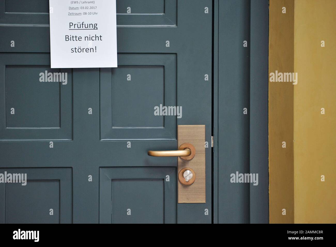An "Exam: Please do not disturb" sign on a door in the main building of ...