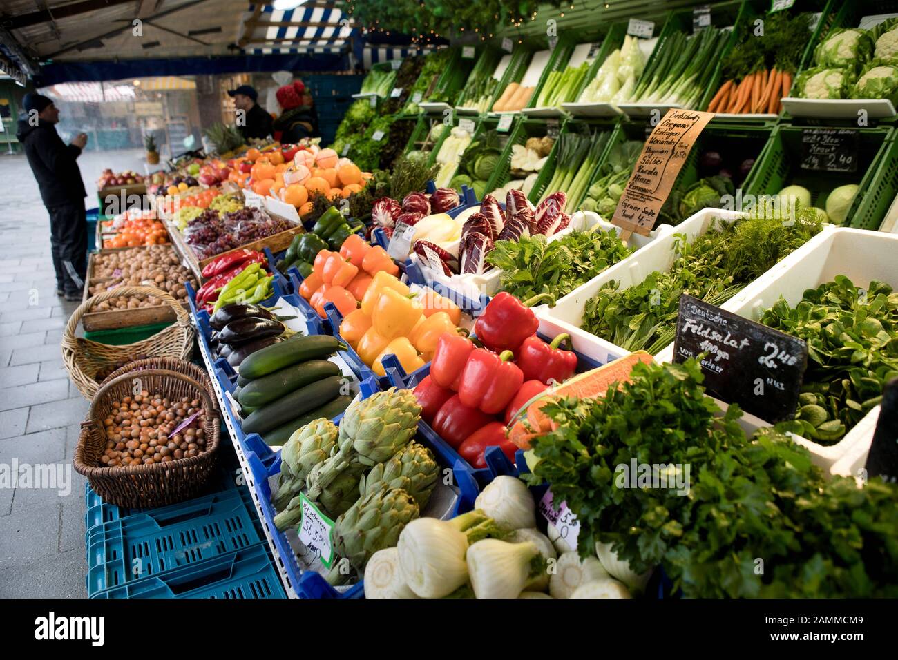 Fruit and vegetable dealer at the Viktualienmarkt in Munich. [automated ...