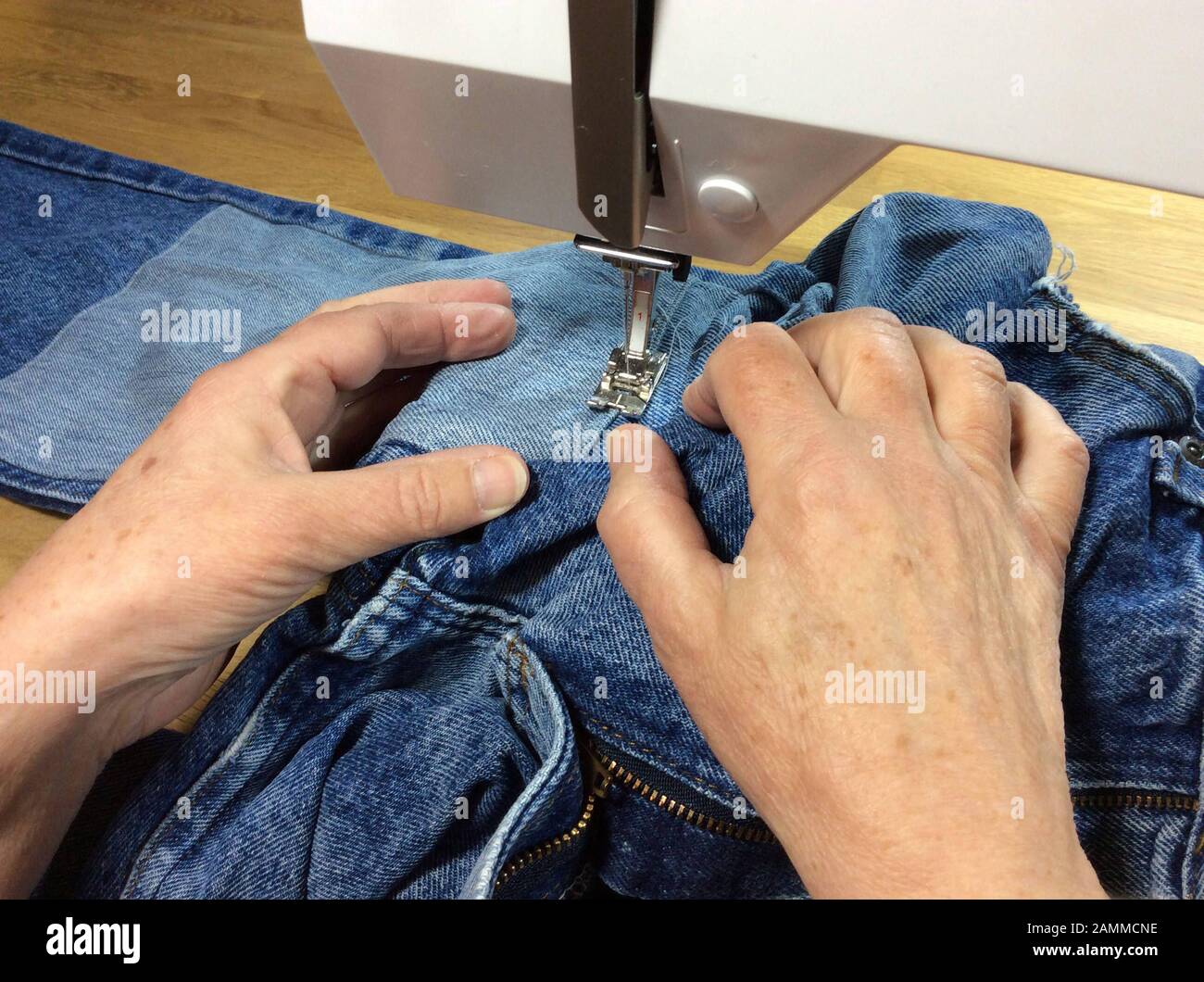 Housework. Woman doing the mending. [automated translation] Stock Photo ...