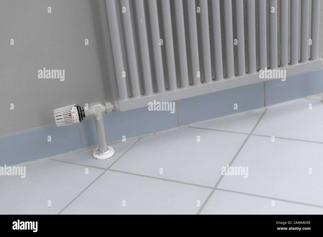 Radiator with thermostat in an apartment in Munich. [automated ...