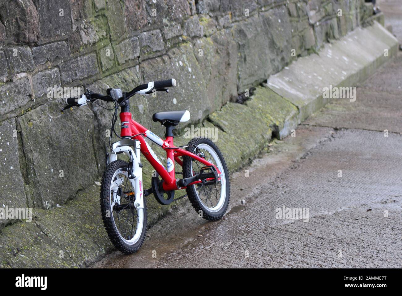 Red kids cycle, England Stock Photo - Alamy