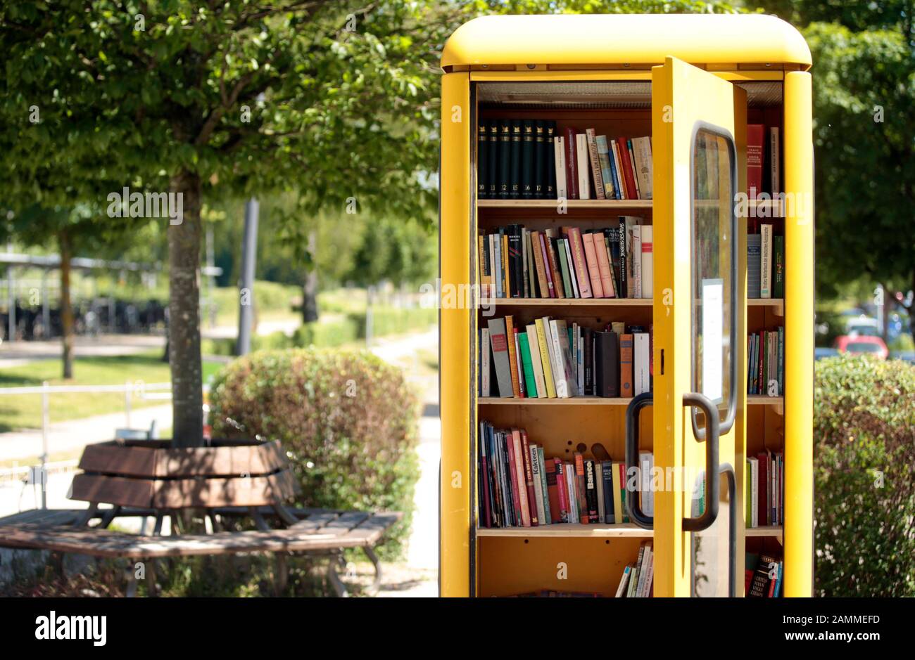 A telephone booth was converted into a mini-library and serves as a ...