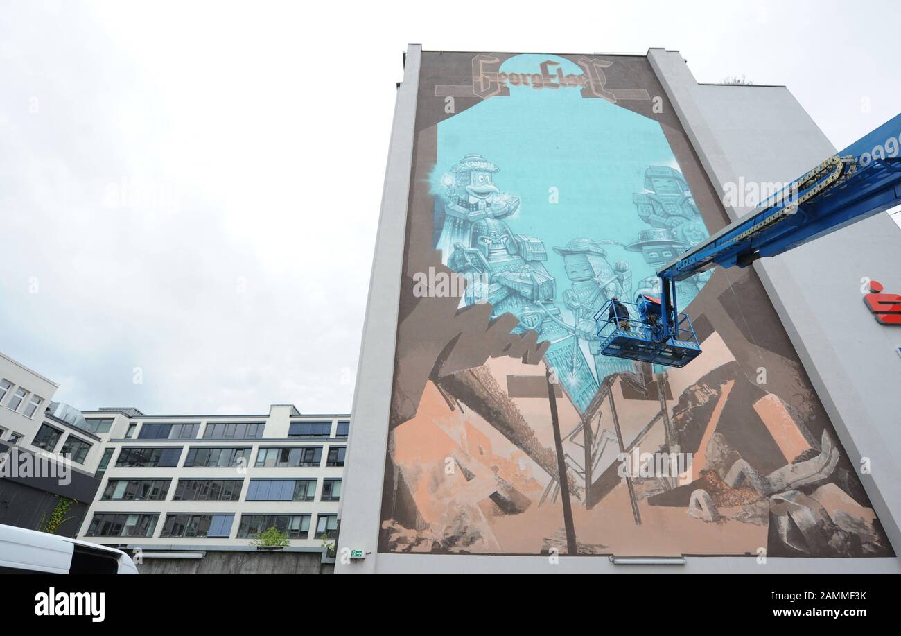 22-metre-high graffito by street artists Loomit (left) and WonABC on a ...