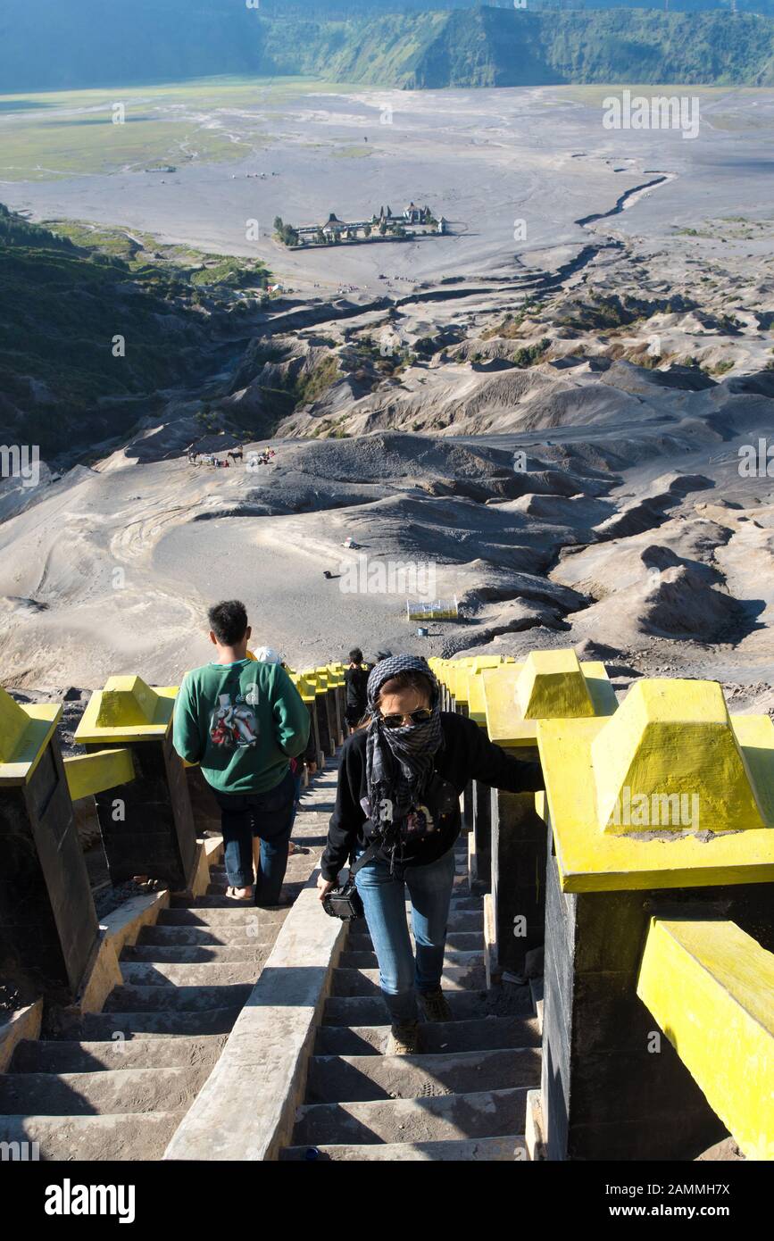 Tourists hiking to Mount Bromo,The active Mount Bromo is one of the ...