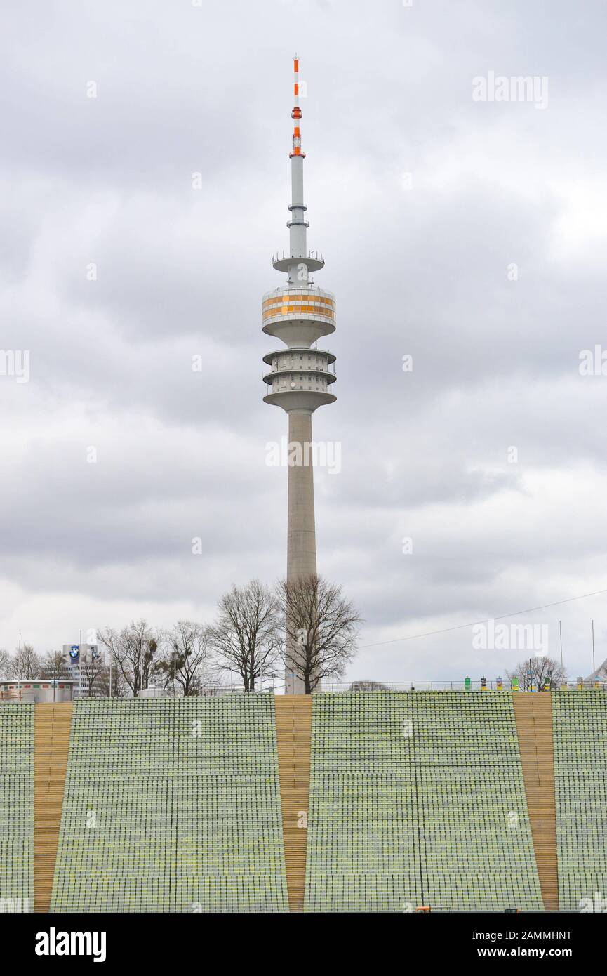 Empty grandstand in the Olympic Stadium and view of the Olympic Tower ...