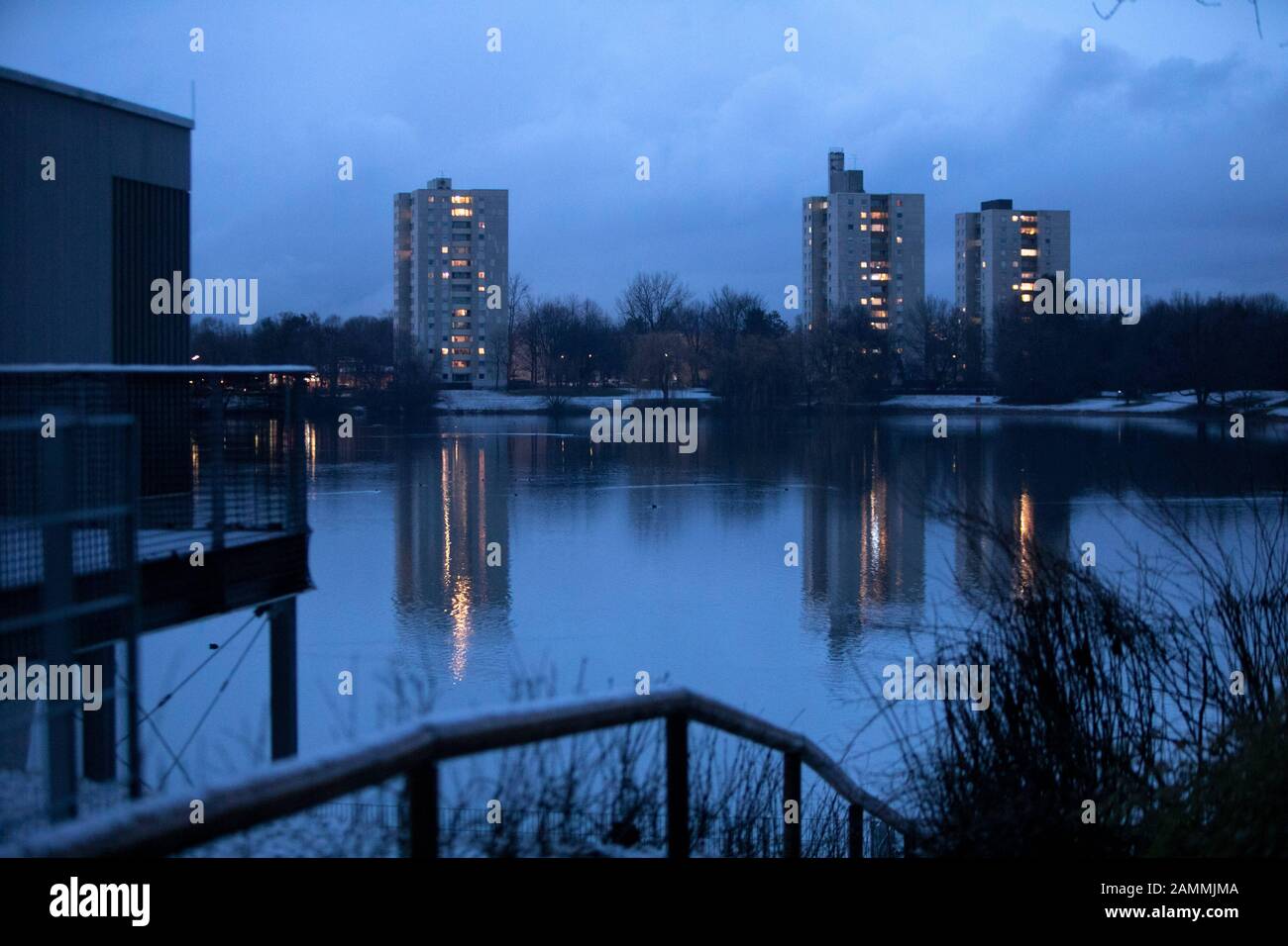 High-rise buildings and buildings of the water guard at dusk at ...