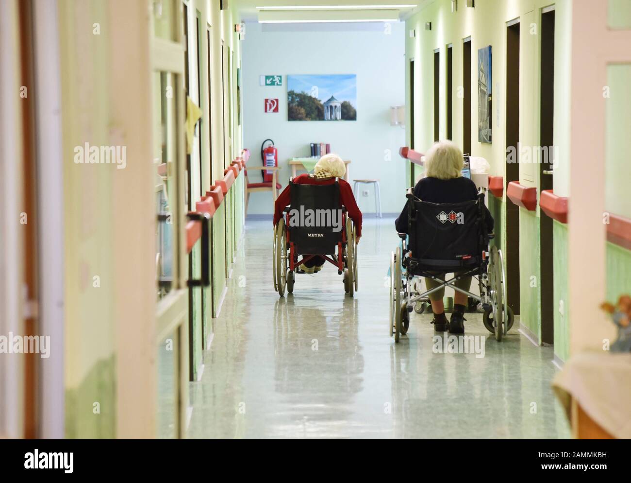 Seniors on a corridor in the retirement home of the Red Cross at the ...