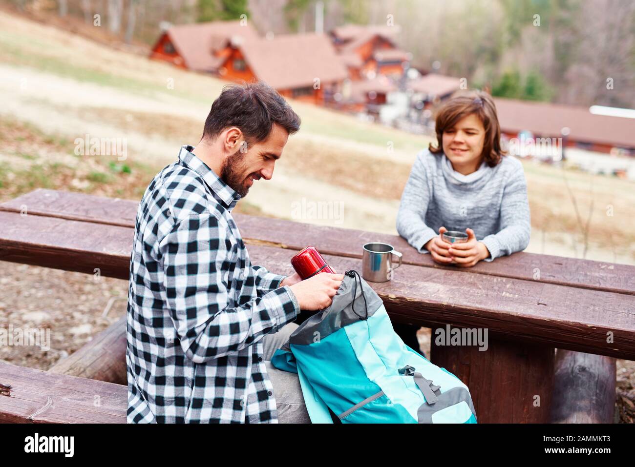 Man packing backpack for the hiking Stock Photo - Alamy