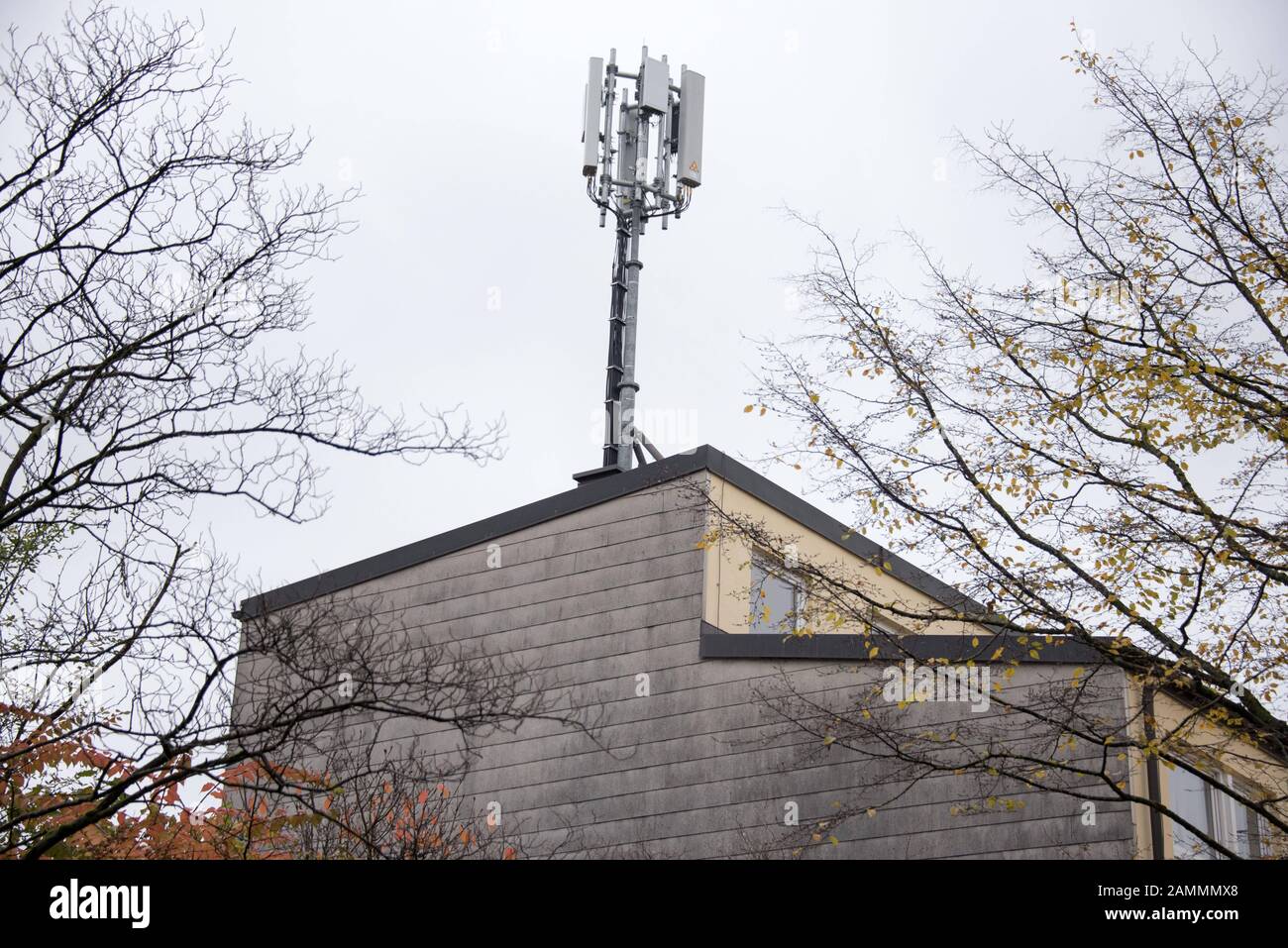 5 G mobile radio antenna on a roof in Milbertshofen. [automated ...