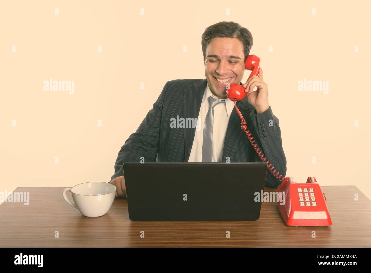 Happy businessman talking telephone hi-res stock photography and images ...