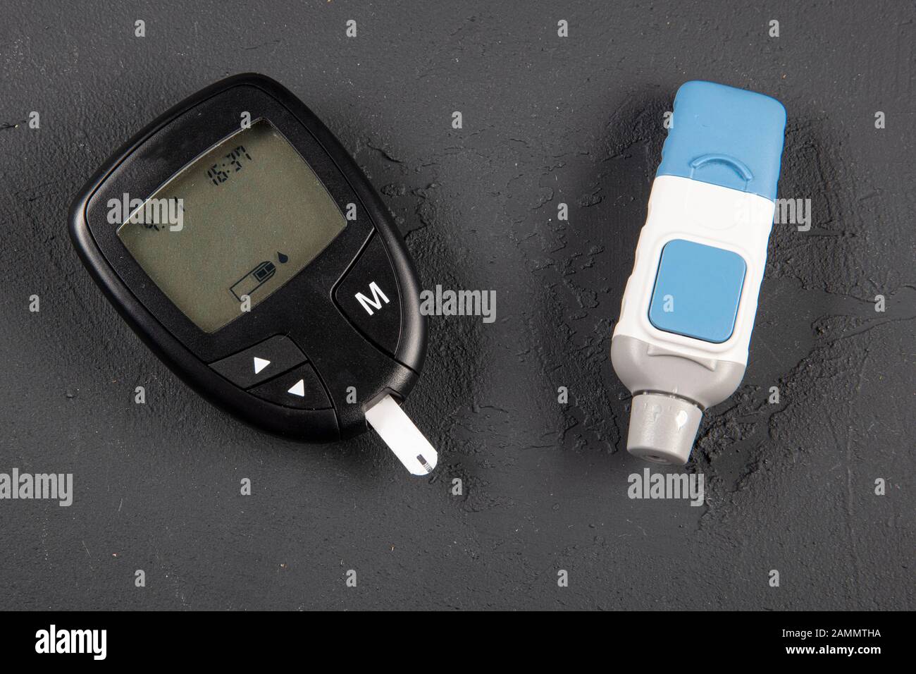 Glucometer (Sugar measuring device) and syringe for insulin, monitoring ...