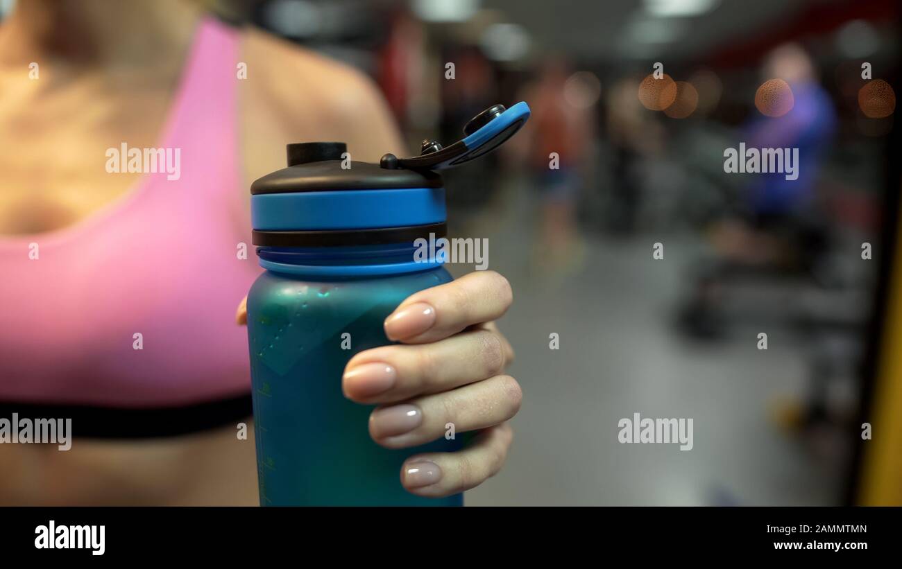 Sporty Woman Holding Water Bottle Close Up Restoring Aqua Balance