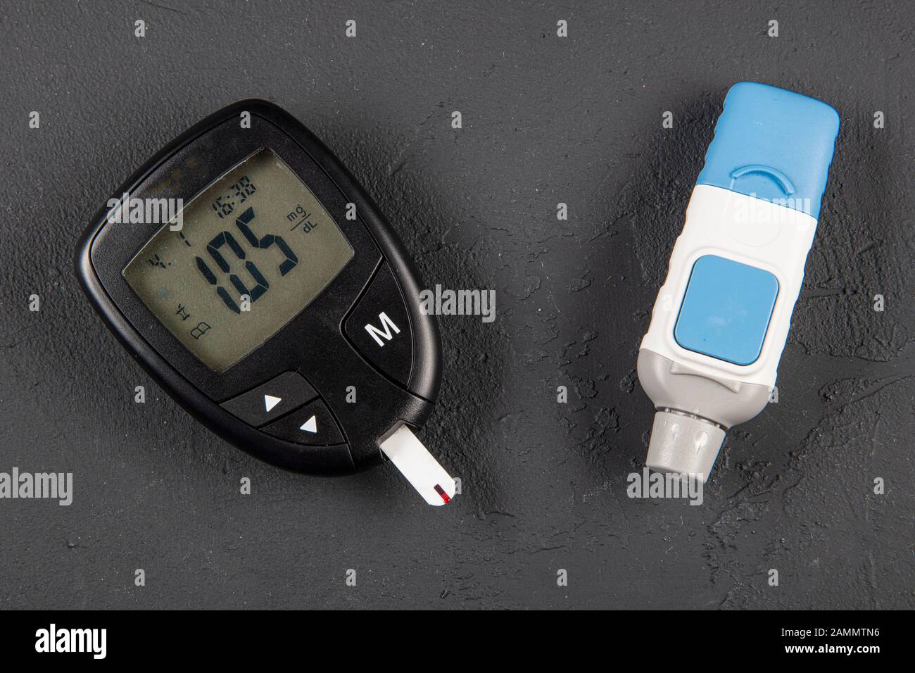 Glucometer (Sugar measuring device) and syringe for insulin, monitoring ...