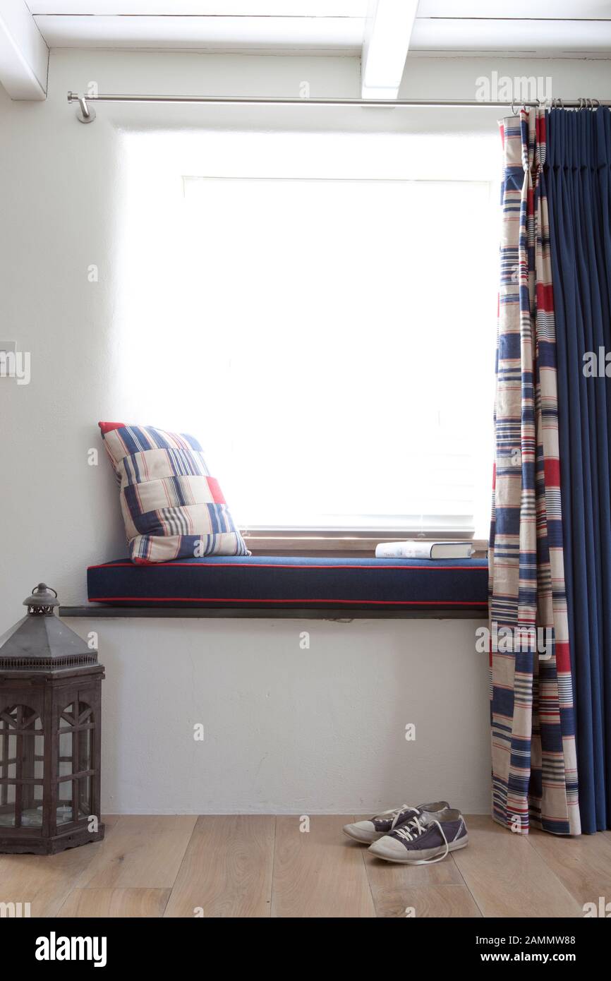 Interior hallway with window seat Stock Photo - Alamy