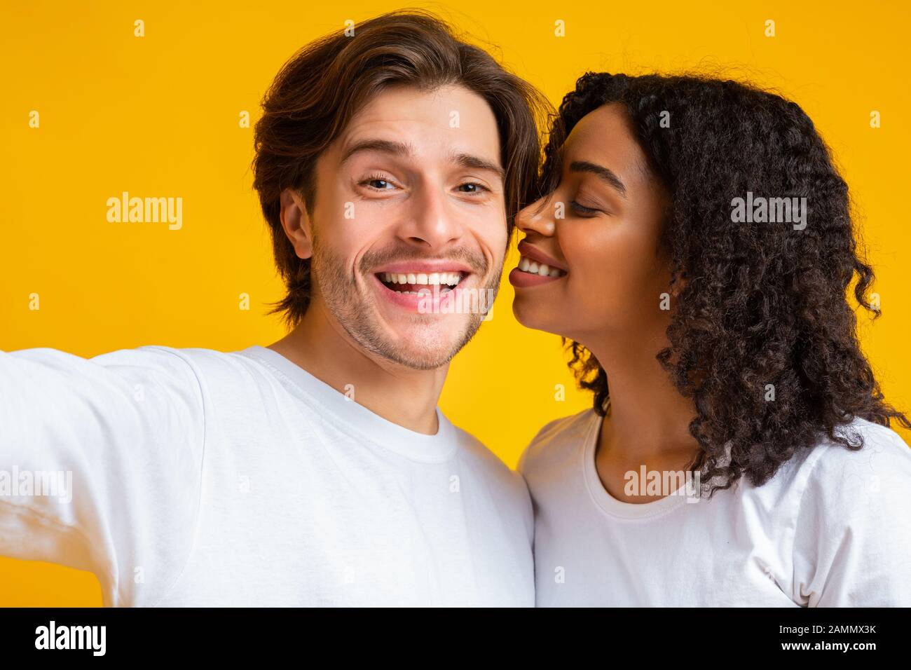Happy Interracial Lovers Taking Selfie Together Black Girl Kissing Her