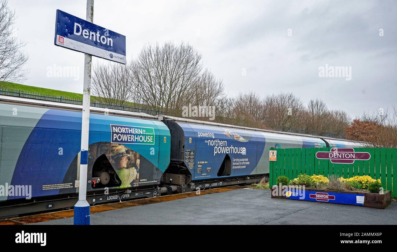 A freight train passes through denton station hi-res stock photography ...