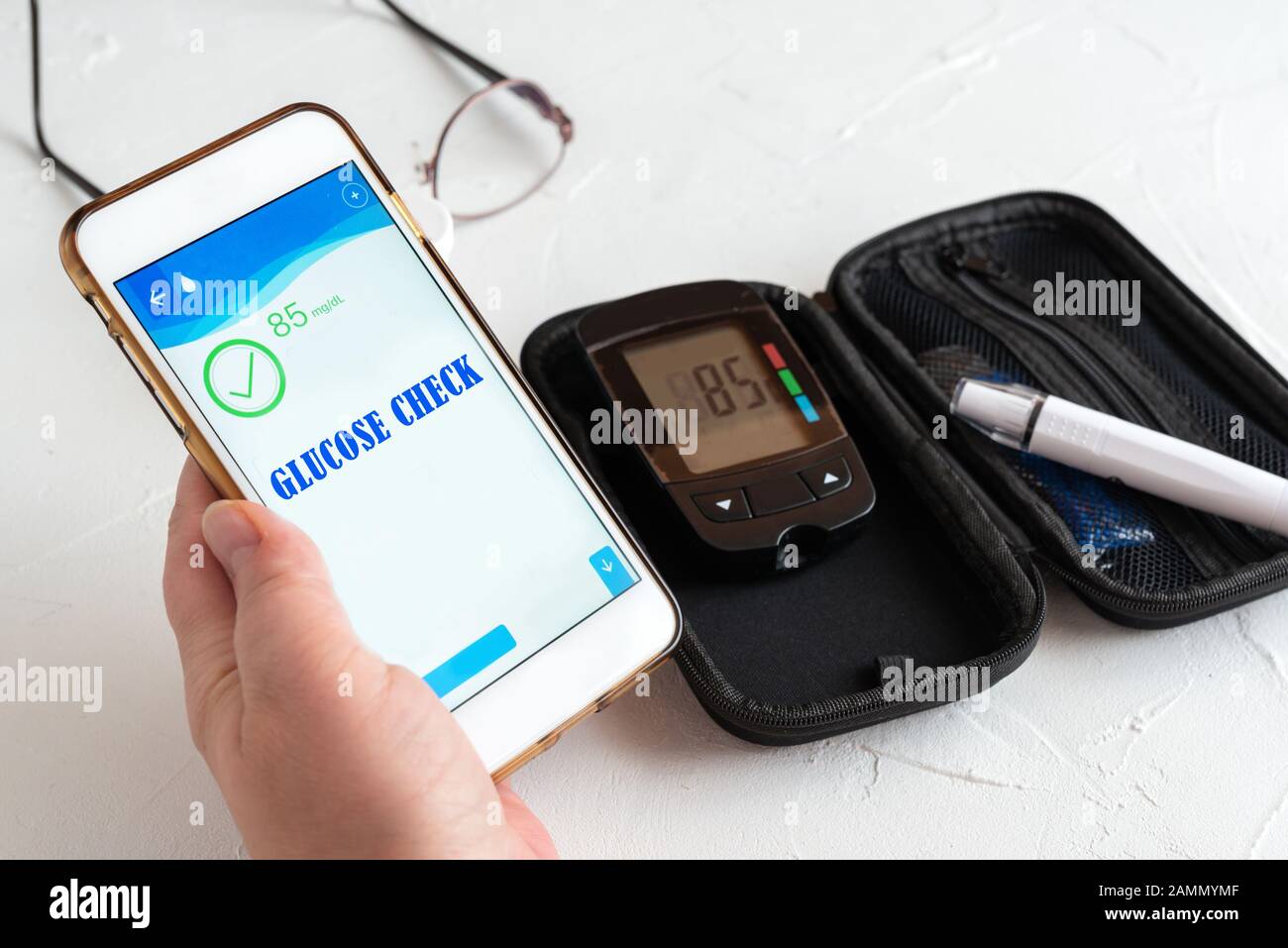 Measuring glucose levels and using smart phone. Healthcare and medical ...